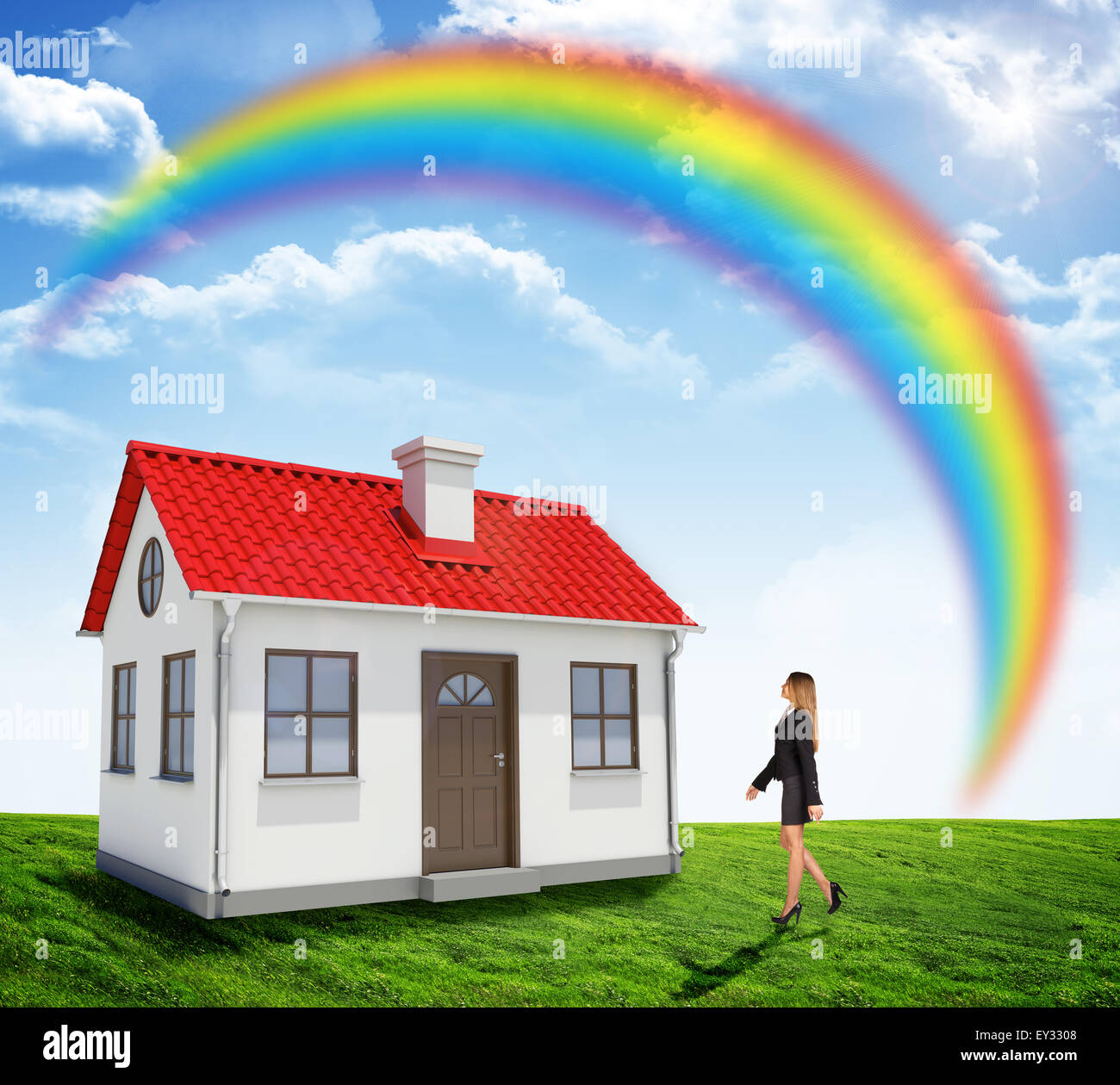 Businesswoman going to house with rainbow Stock Photo - Alamy