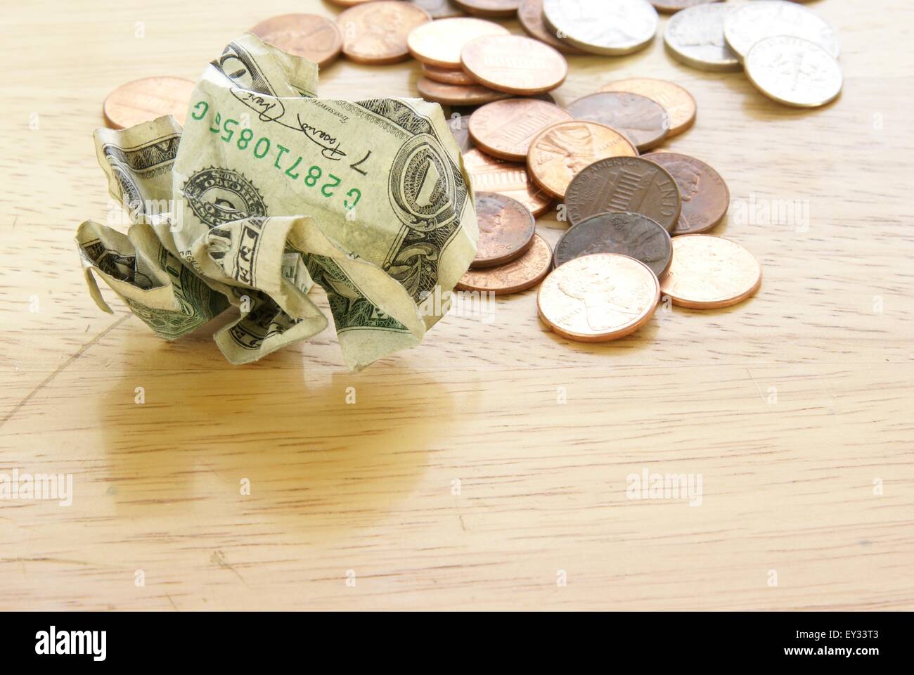 Wadded dollar bill hi-res stock photography and images - Alamy
