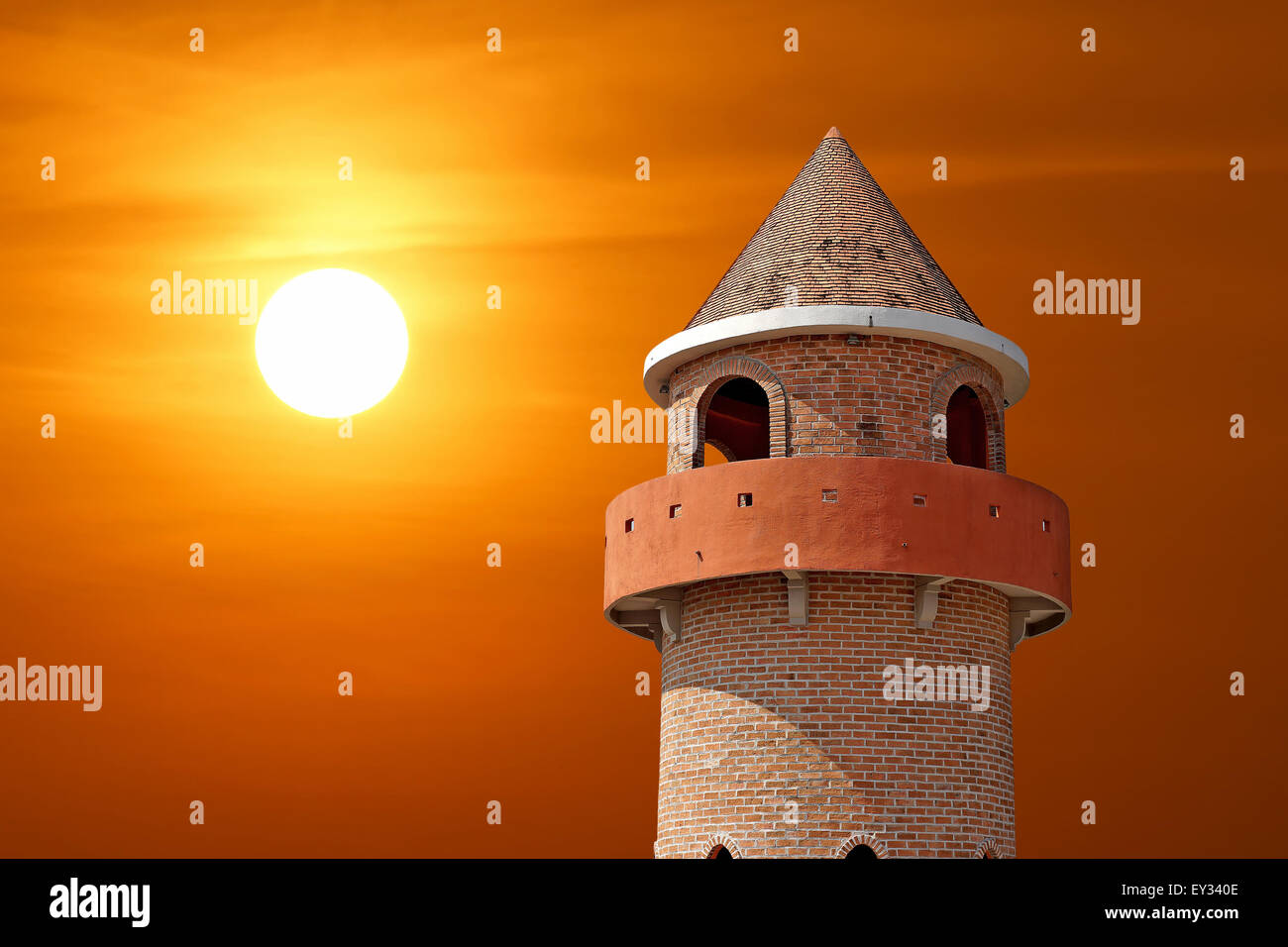 part of a castle tower with beautiful sunset background Stock Photo - Alamy