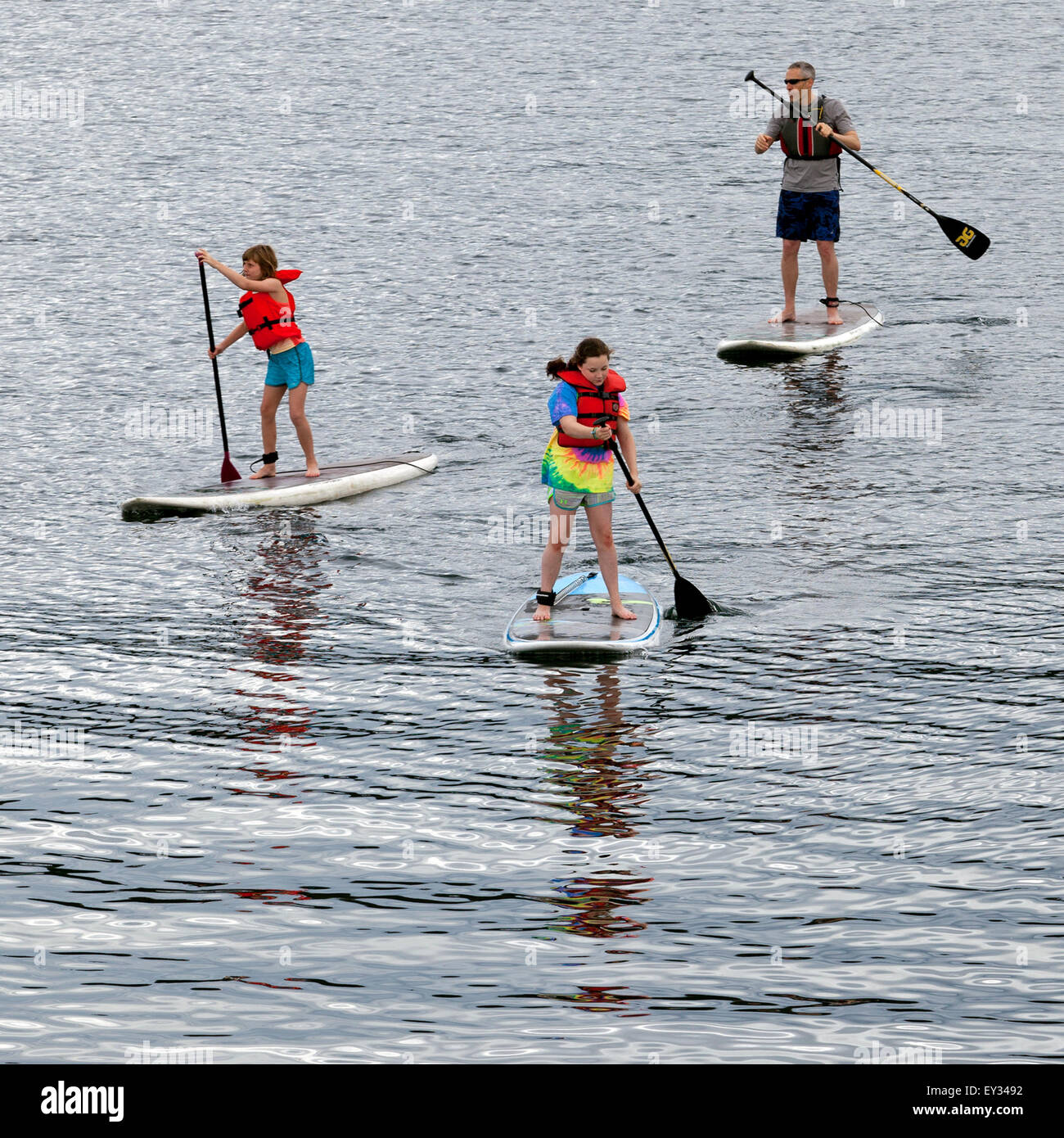 Children paddling hi-res stock photography and images - Alamy