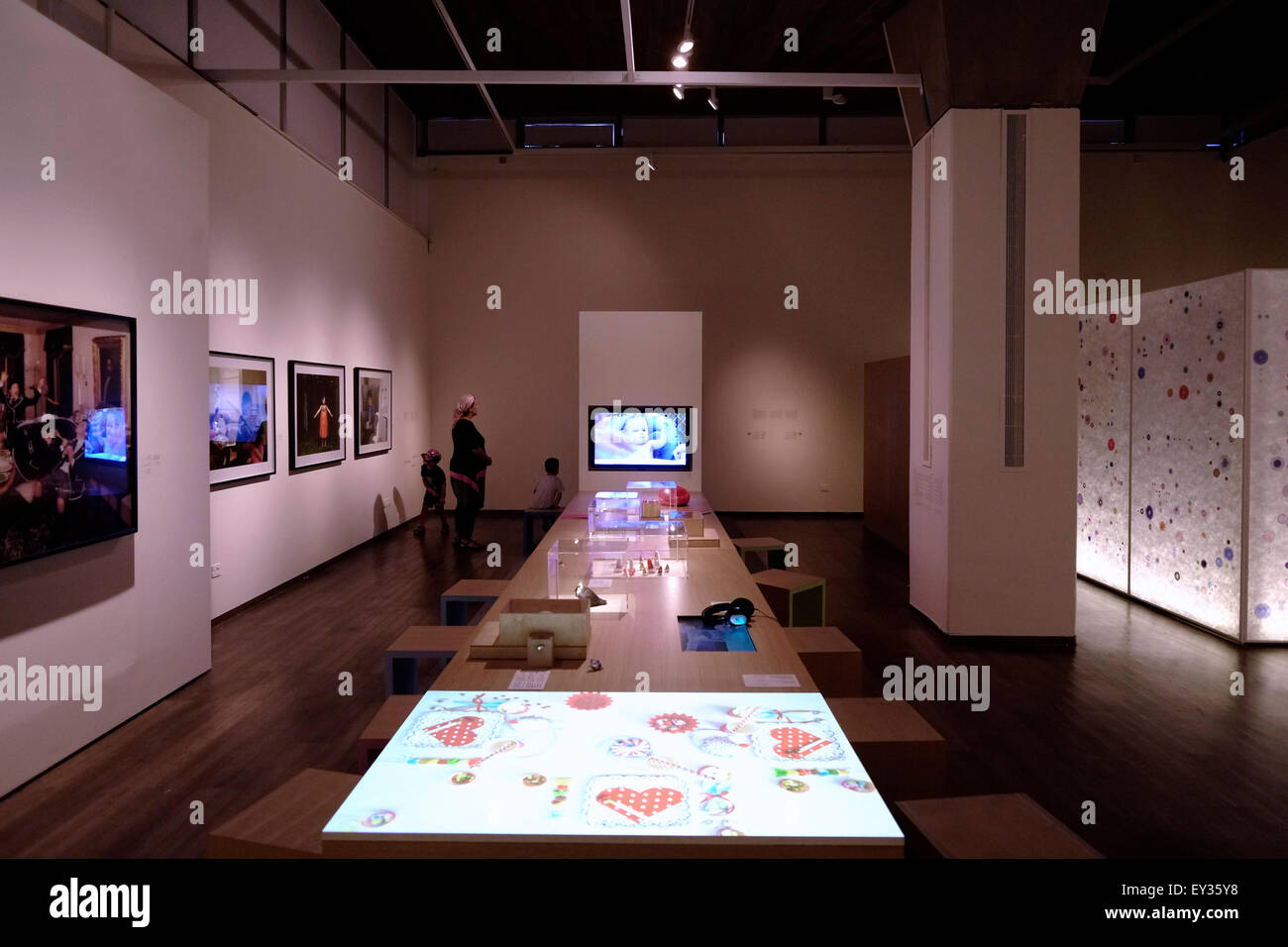 Visitors looking at items displayed inside the Ruth Youth Wing for Art ...