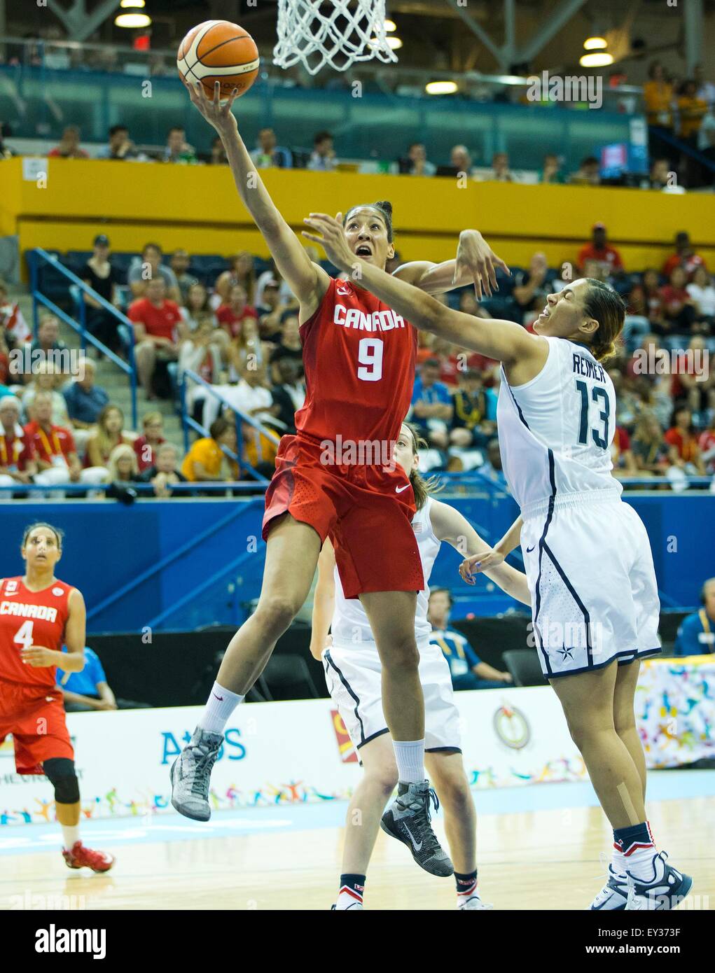 Toronto, Canada. 20th July, 2015. Miranda Ayim(2nd L) of Canada goes to ...