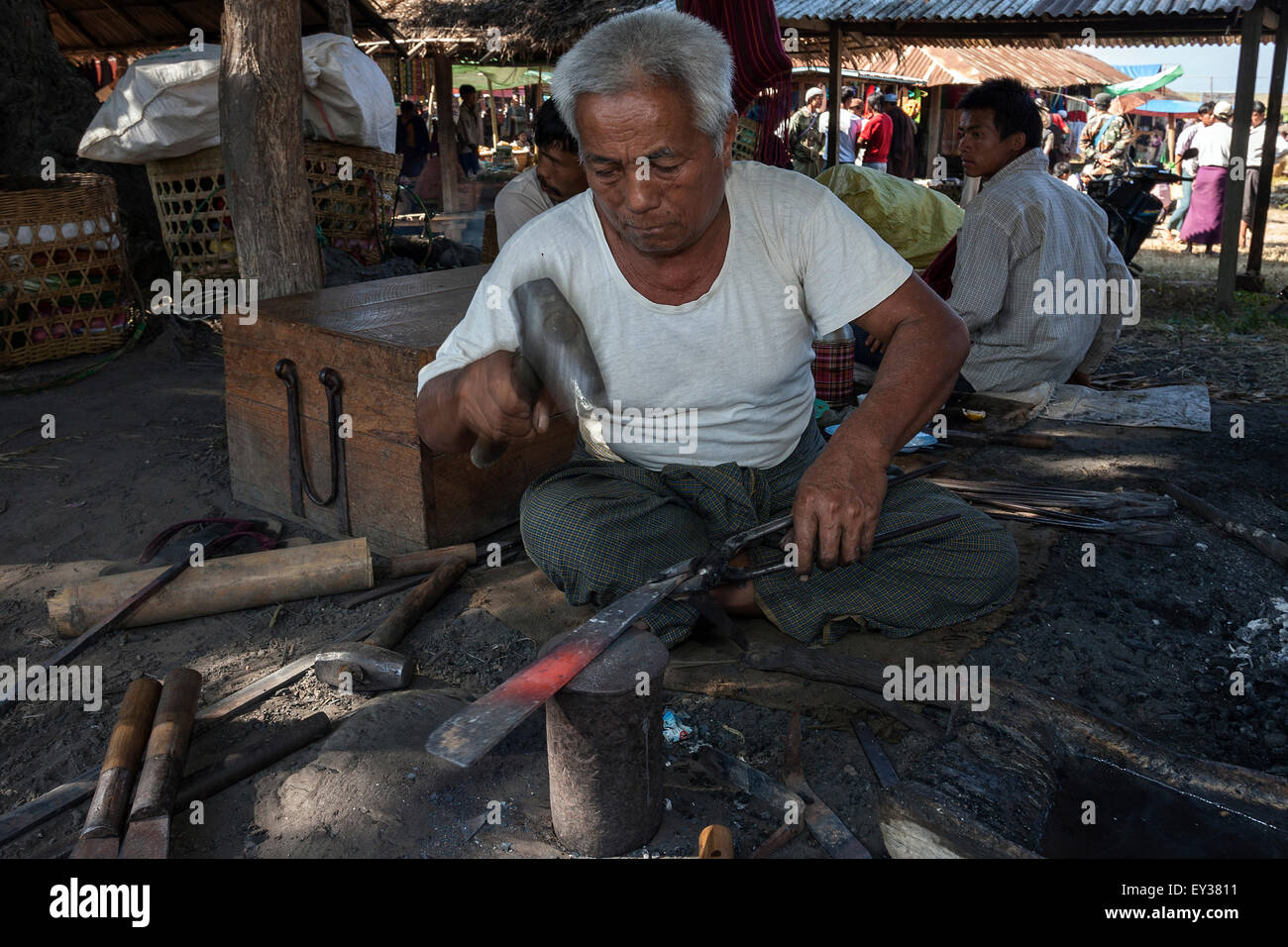 One smith blacksmith man forging hi-res stock photography and images ...