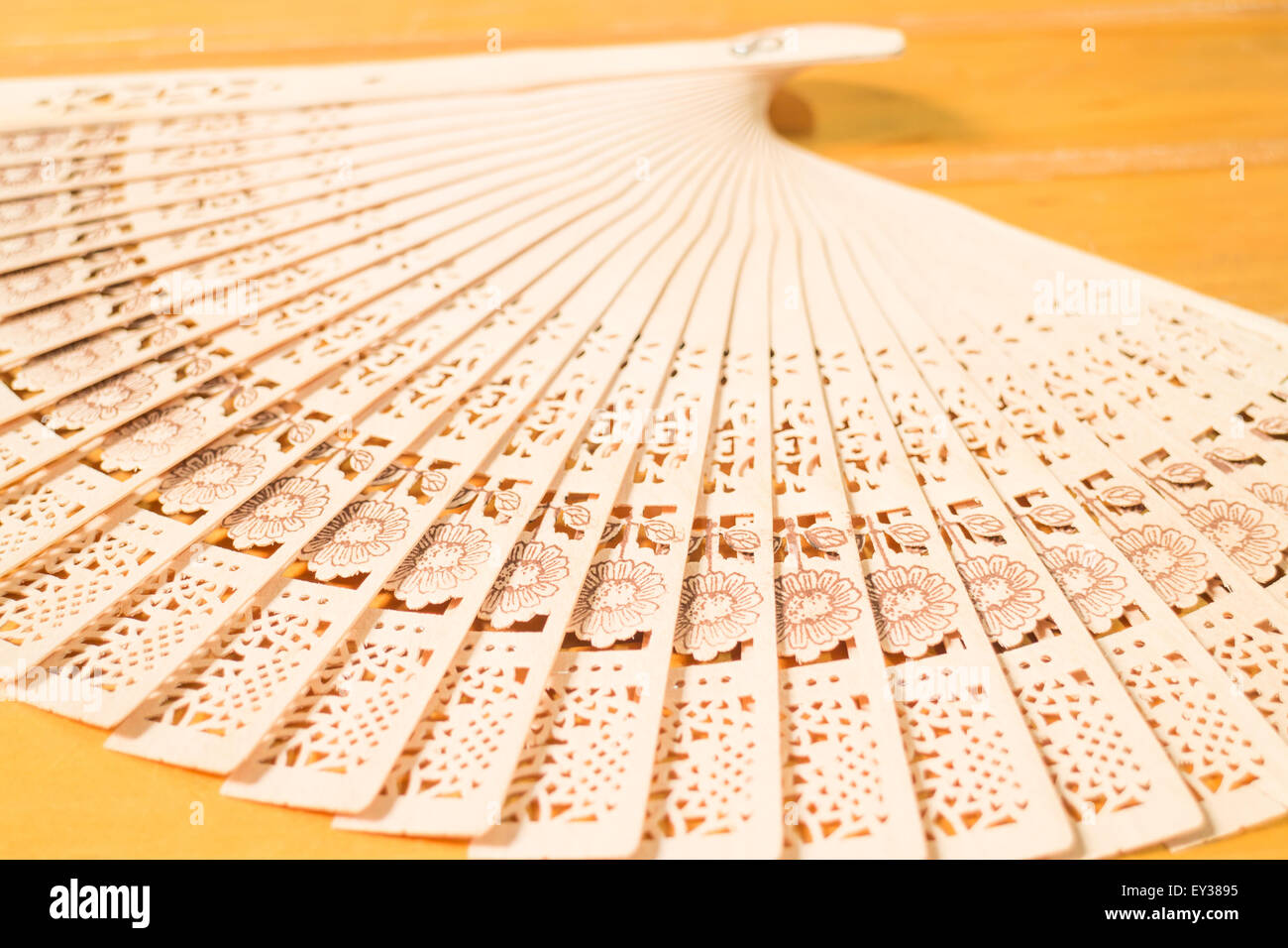 Oriental carved wooden hand fan, stock photo Stock Photo - Alamy