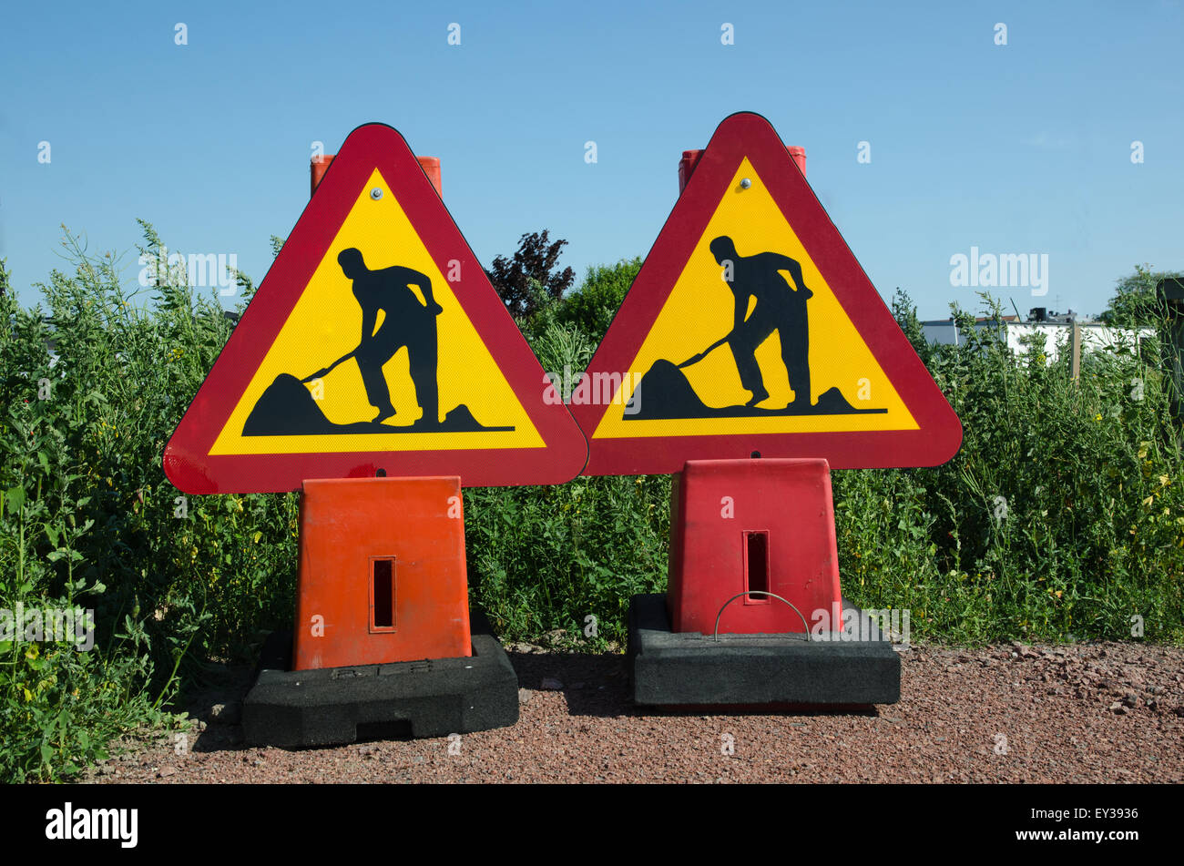 Two red triangle road signs hi-res stock photography and images - Alamy
