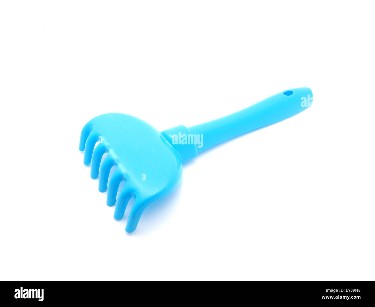 Children rake on a white background Stock Photo - Alamy