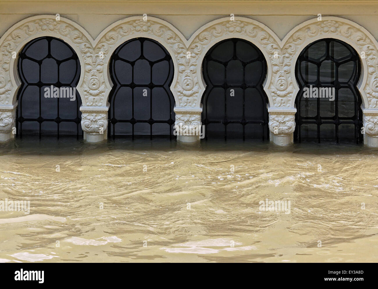 The flood reaches up to arched carved windows Stock Photo - Alamy