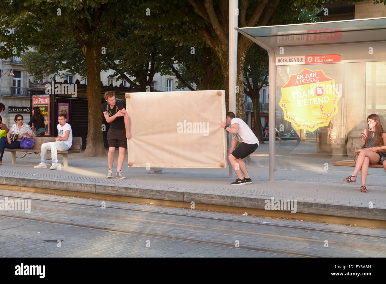 Two men carrying bed frame hi-res stock photography and images - Alamy