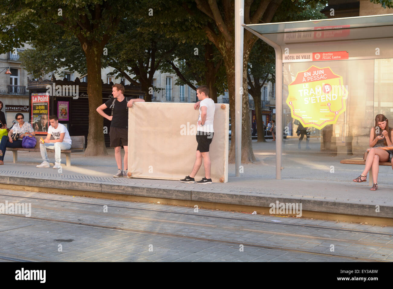Two men carrying bed frame hi-res stock photography and images - Alamy