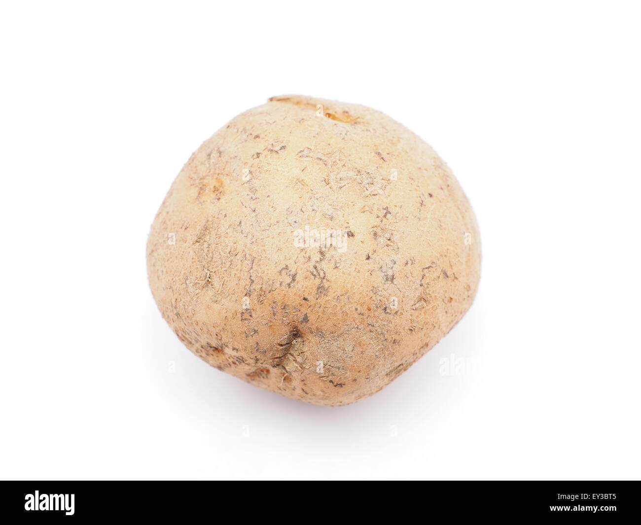 unpeeled potatoes on a white background Stock Photo - Alamy