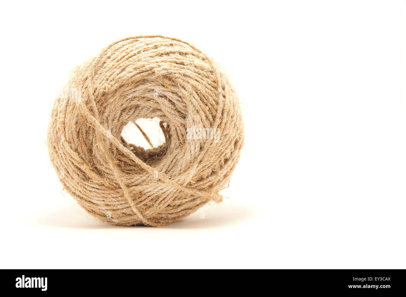 ball of twine on a white background Stock Photo - Alamy