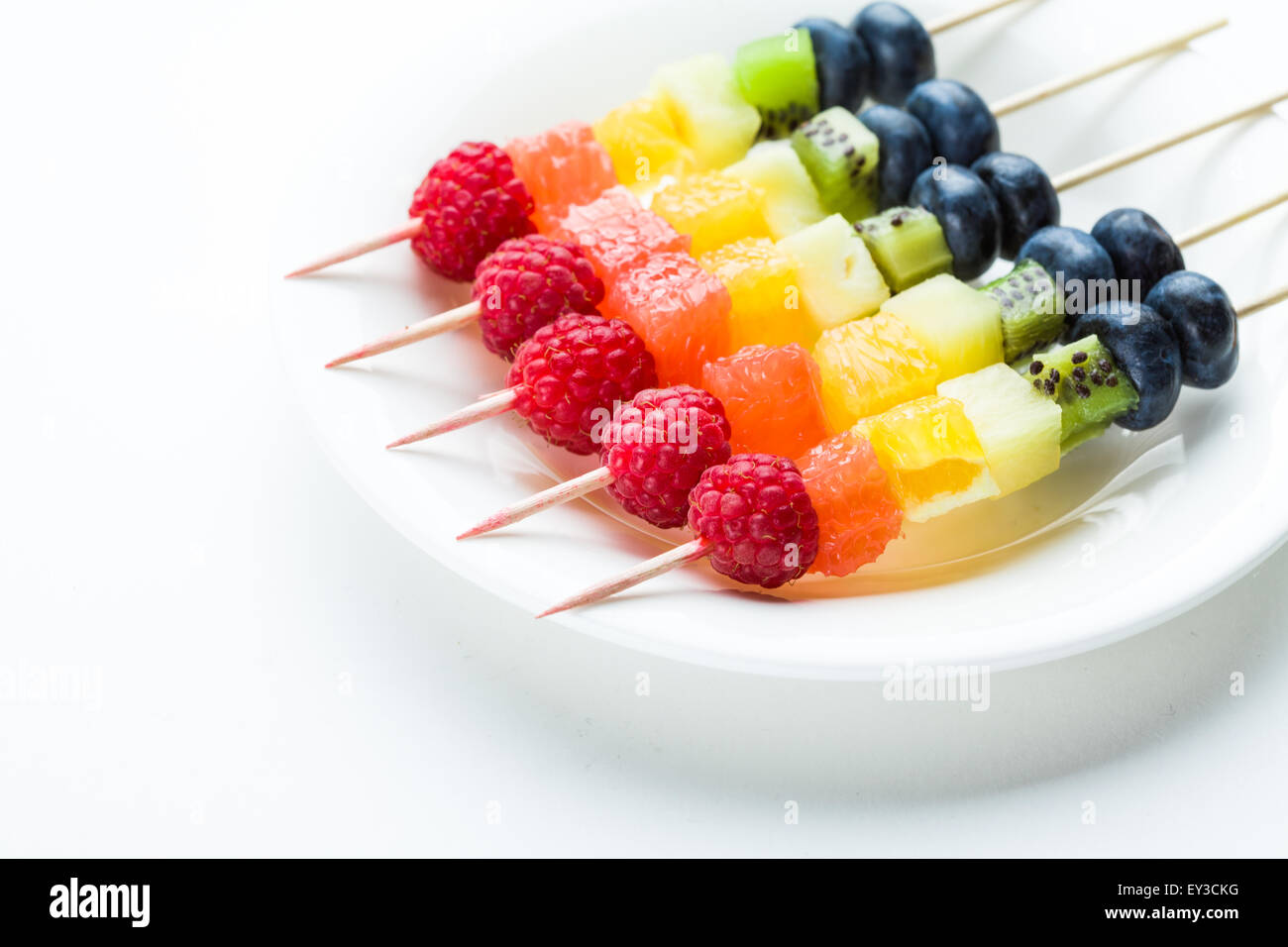 Fresh summer fruits on sticks Stock Photo - Alamy