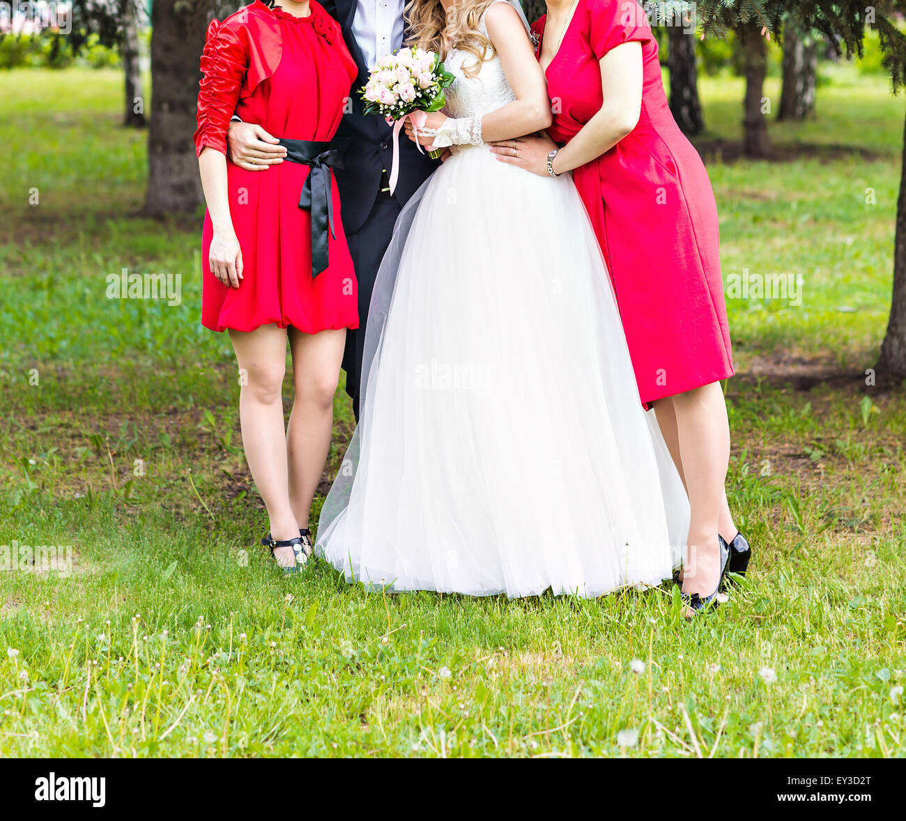 groom and bride with friends Stock Photo - Alamy