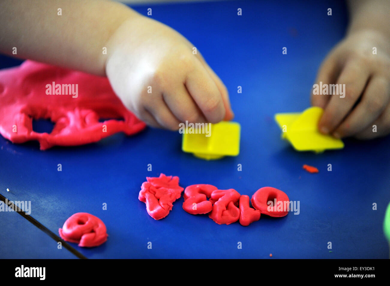 Three year olds playing at school hi-res stock photography and images ...