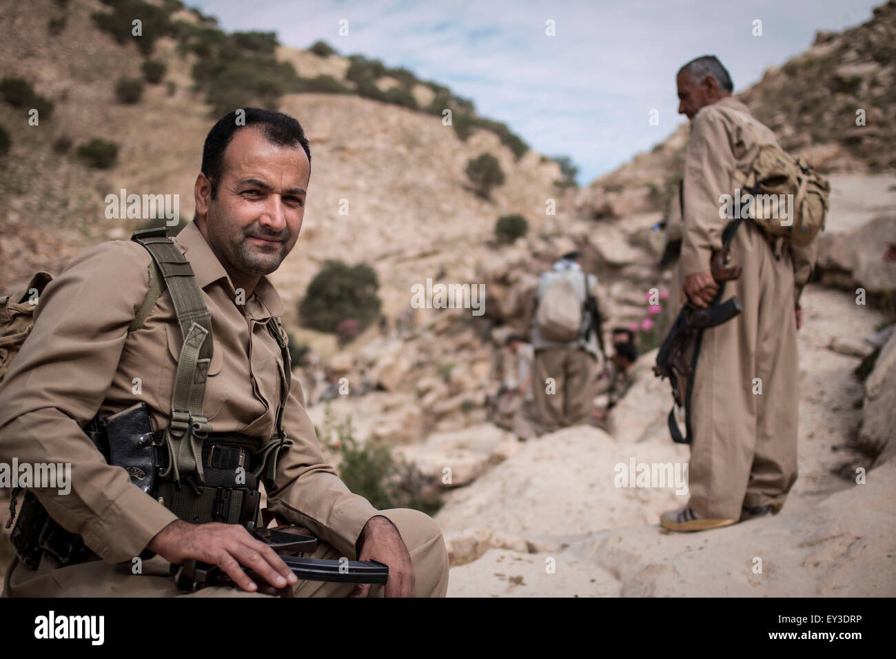 Sulaymaniyah, Iraq. 19th May, 2014. A peshmerga holds his weapon while ...