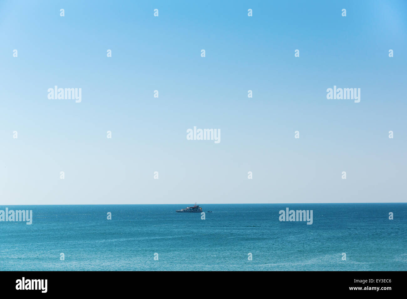 view of the ship far in the sea from the high coast Stock Photo - Alamy