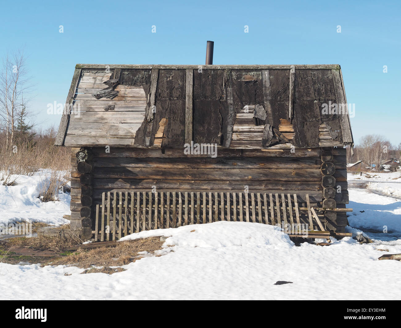 Wooden house in winter village Stock Photo - Alamy