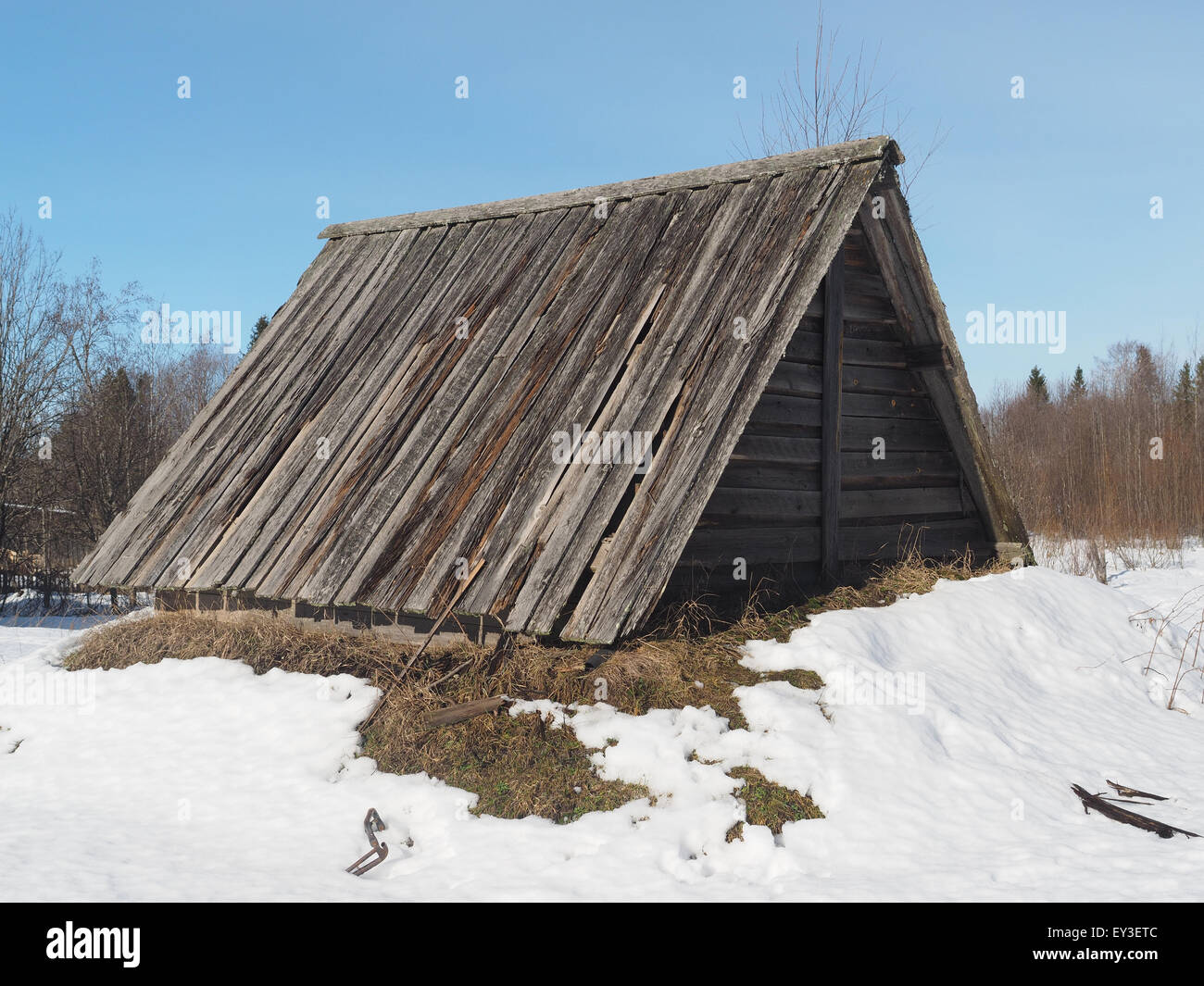 Wooden house in winter village Stock Photo - Alamy