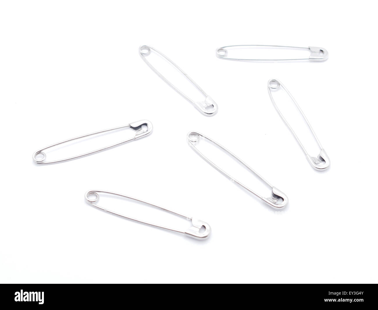 pins on a white background Stock Photo - Alamy
