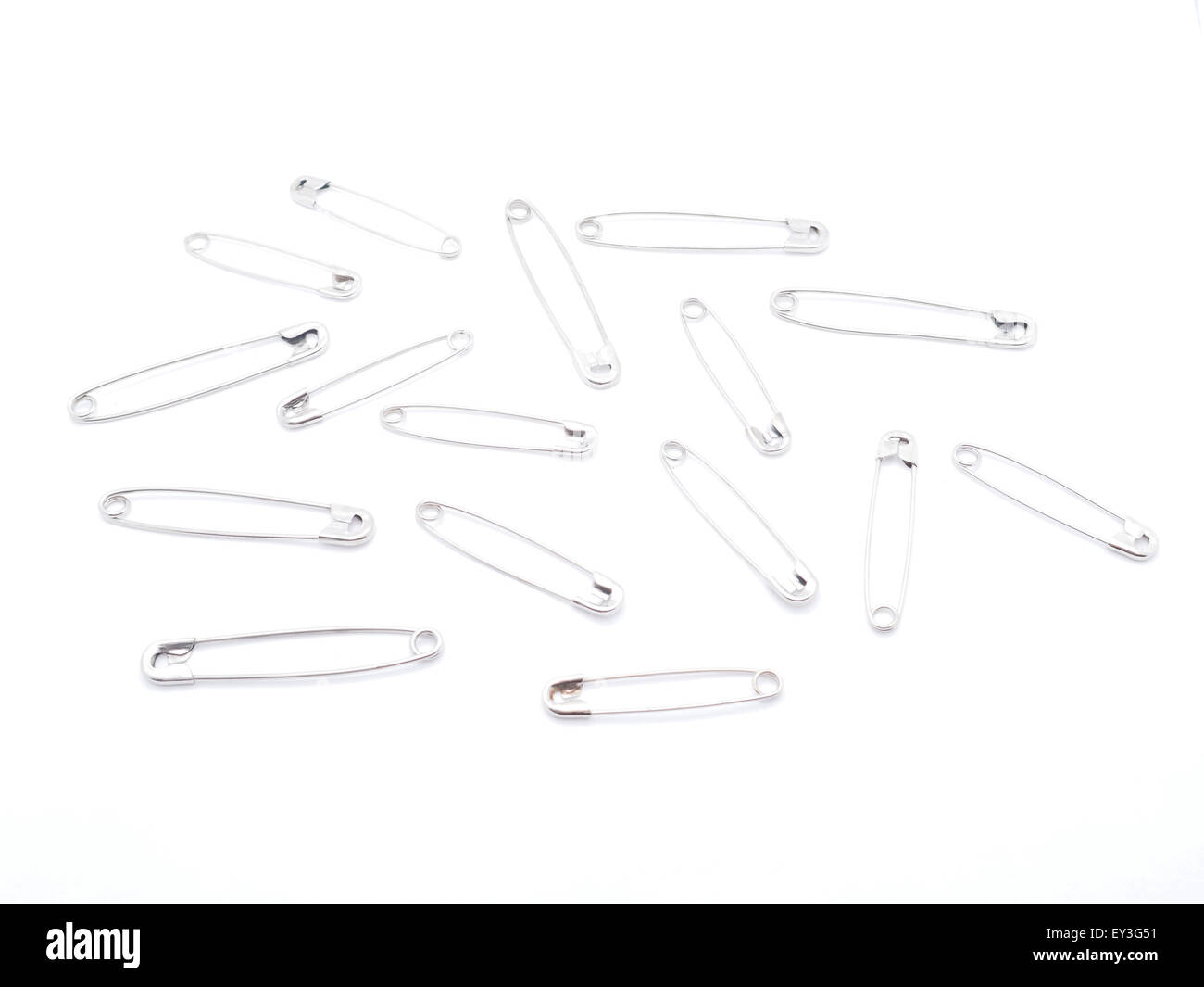 pins on a white background Stock Photo - Alamy