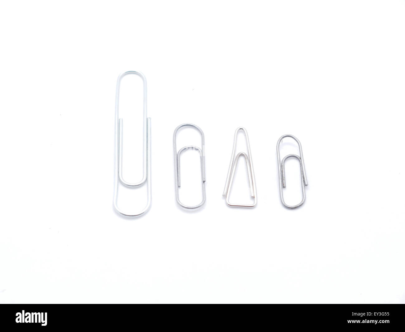 paper clips on a white background Stock Photo - Alamy