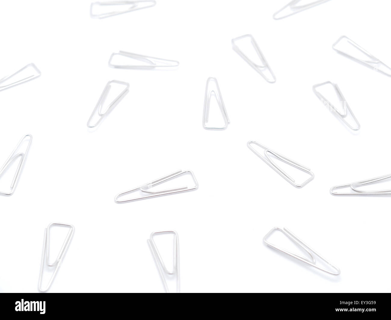 paper clips on a white background Stock Photo - Alamy