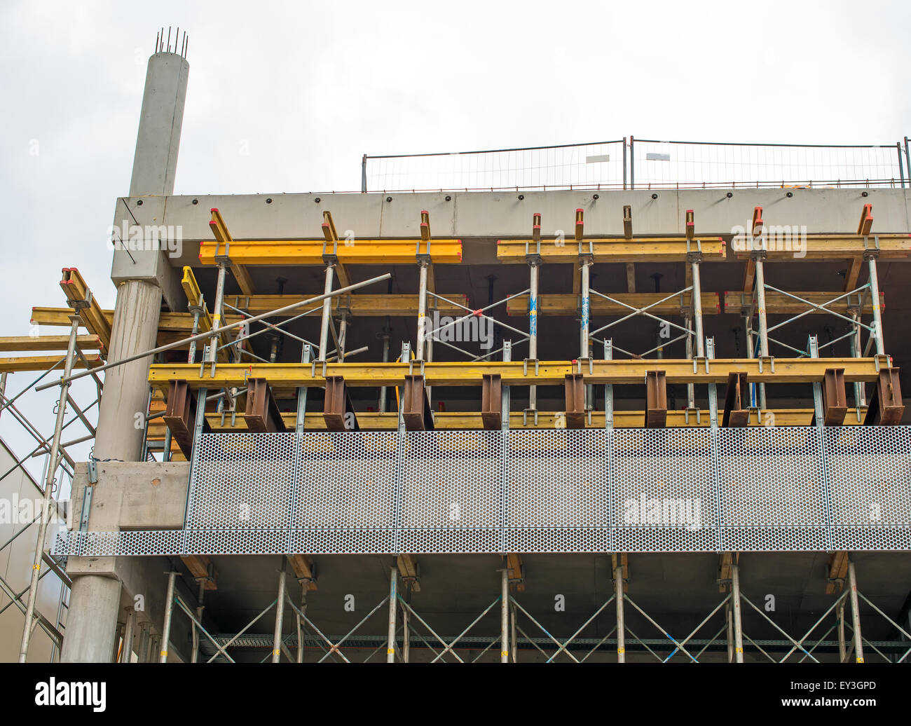 Large construction site with scaffolding building Stock Photo - Alamy