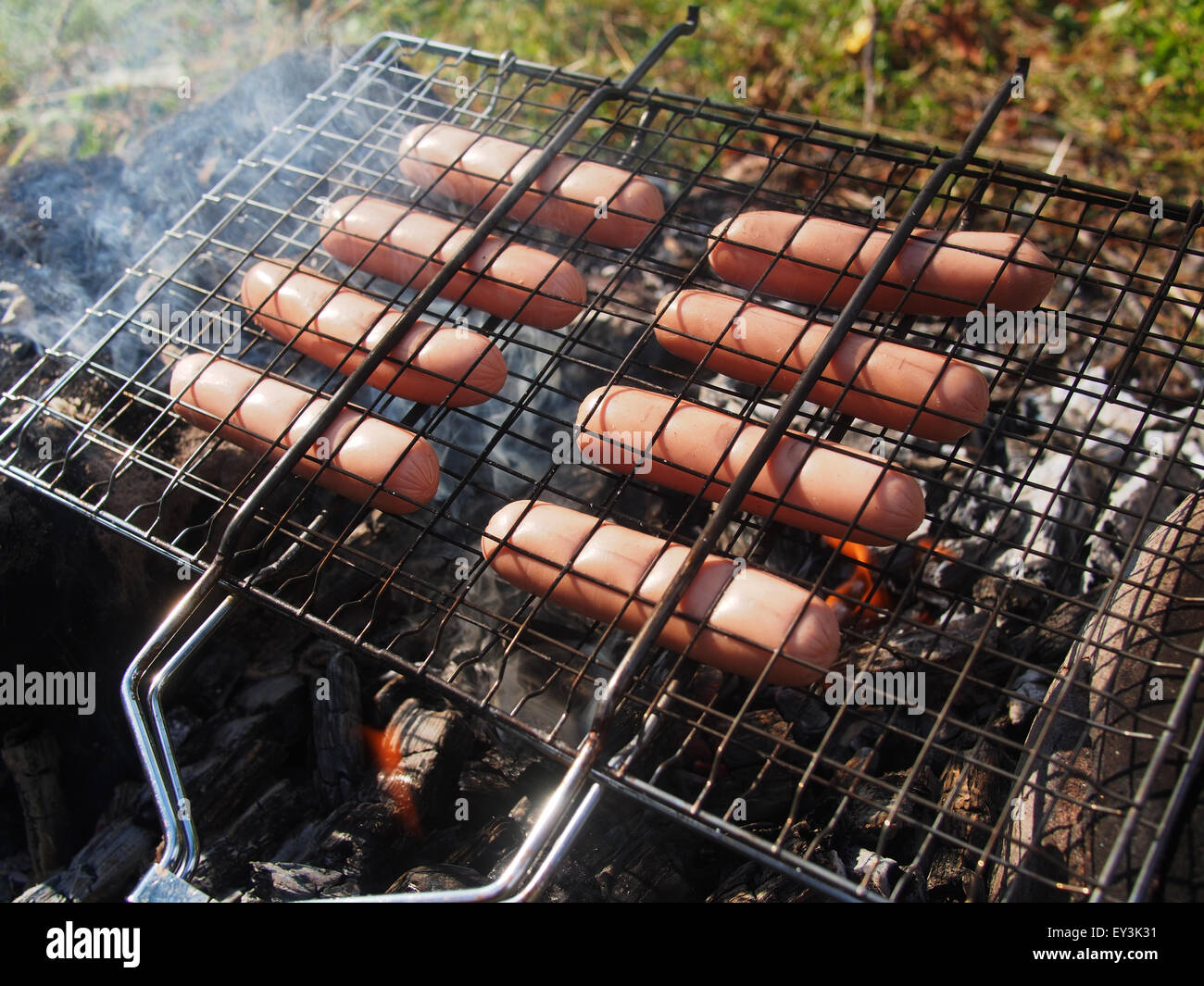 roast sausages on fire Stock Photo - Alamy