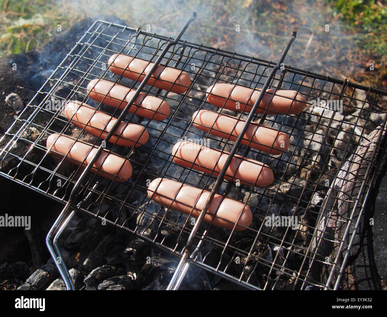 roast sausages on fire Stock Photo - Alamy