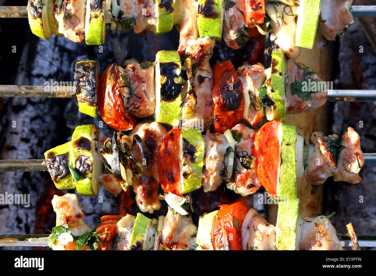 turkey shashlik barbeque with vegetables cooked on real wood fire Stock ...