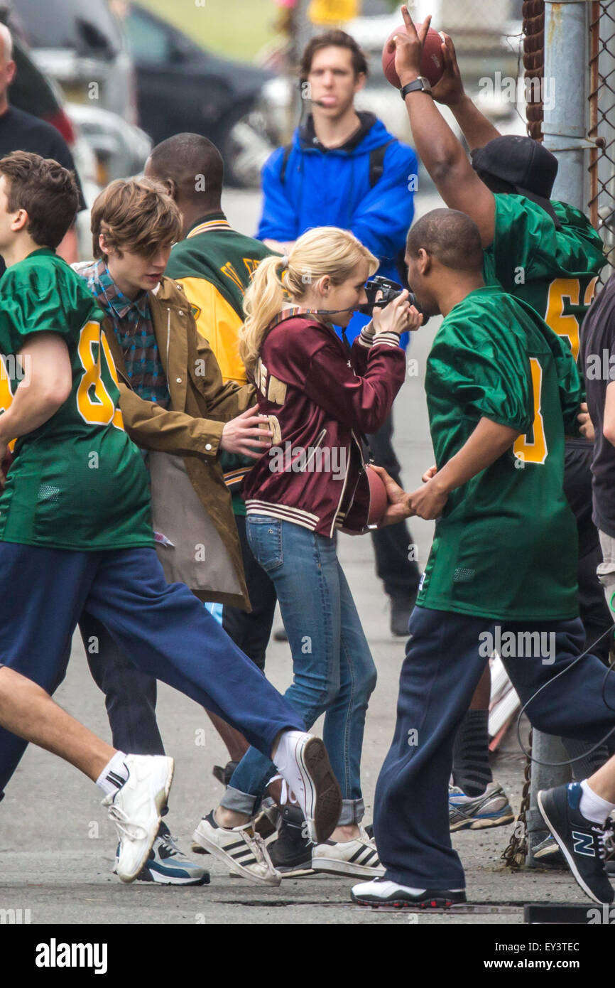 Emma Roberts acting as a high school sports photographer on the set of ...