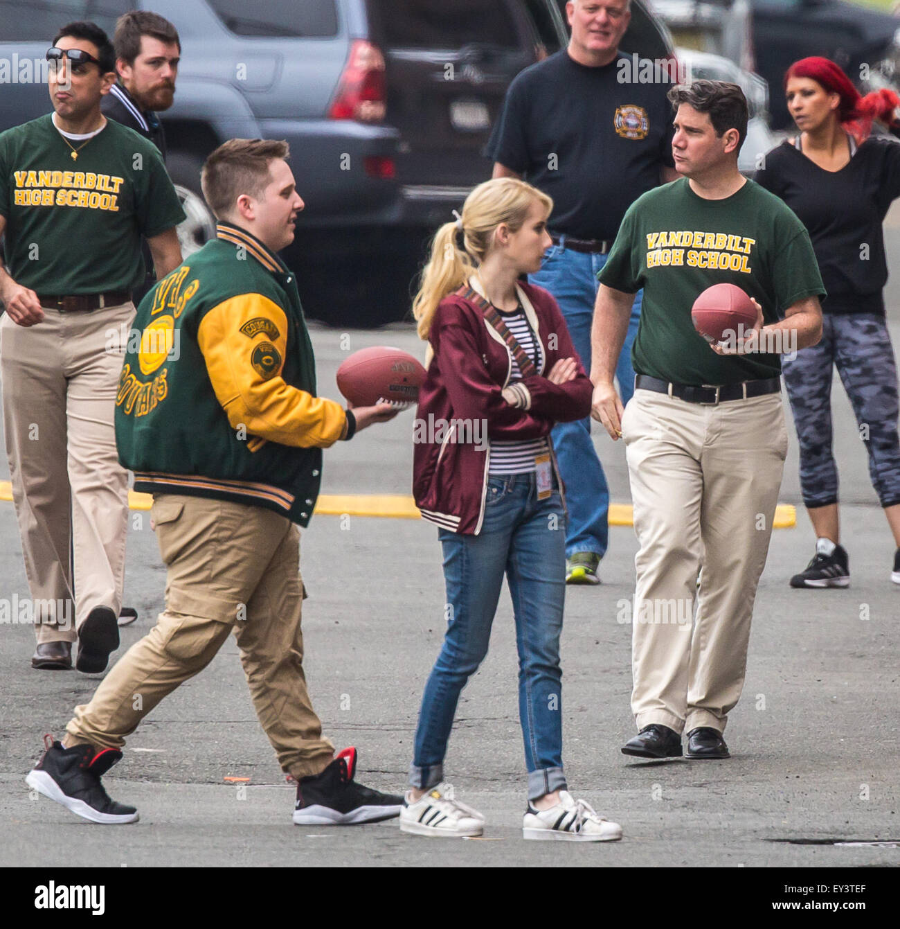 Emma Roberts acting as a high school sports photographer on the set of ...