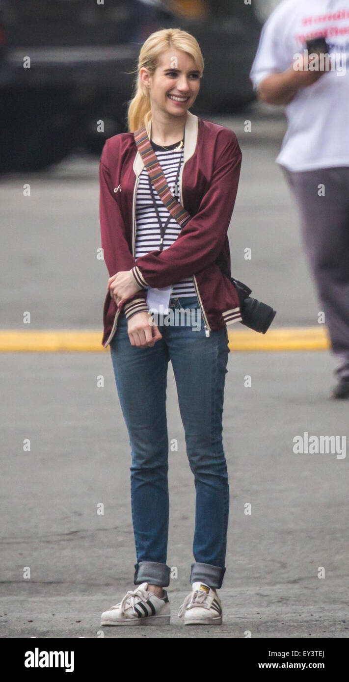 Emma Roberts acting as a high school sports photographer on the set of ...