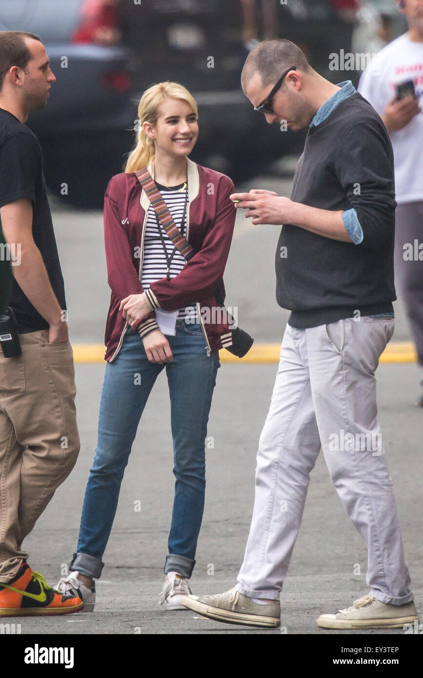 Emma Roberts acting as a high school sports photographer on the set of ...