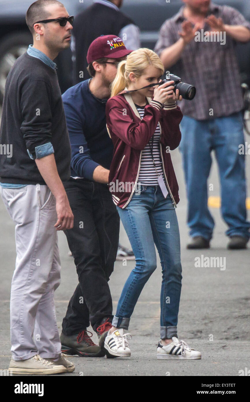 Emma Roberts acting as a high school sports photographer on the set of ...