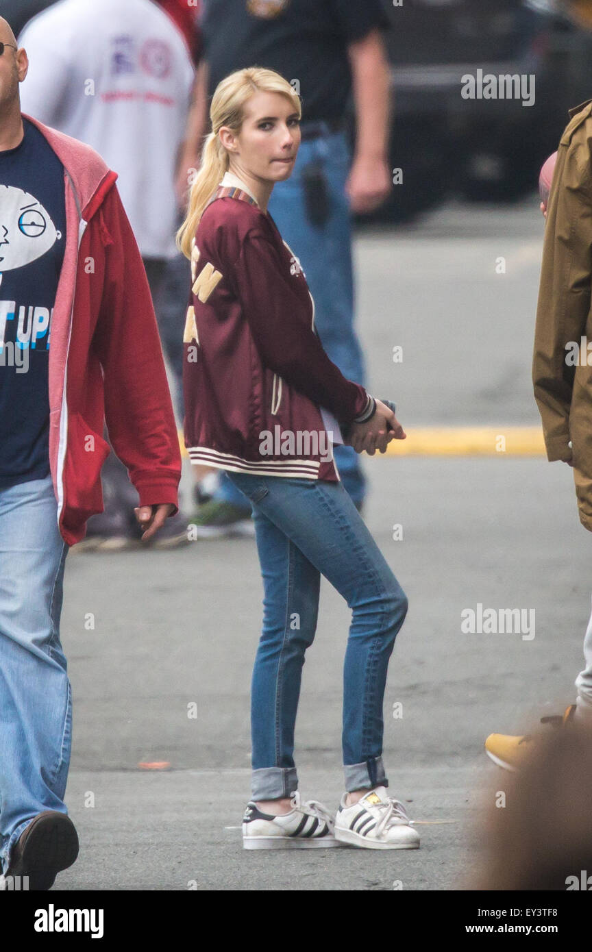 Emma Roberts acting as a high school sports photographer on the set of ...