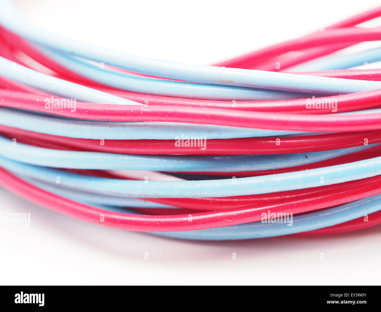 multicolored wire on a white background Stock Photo - Alamy
