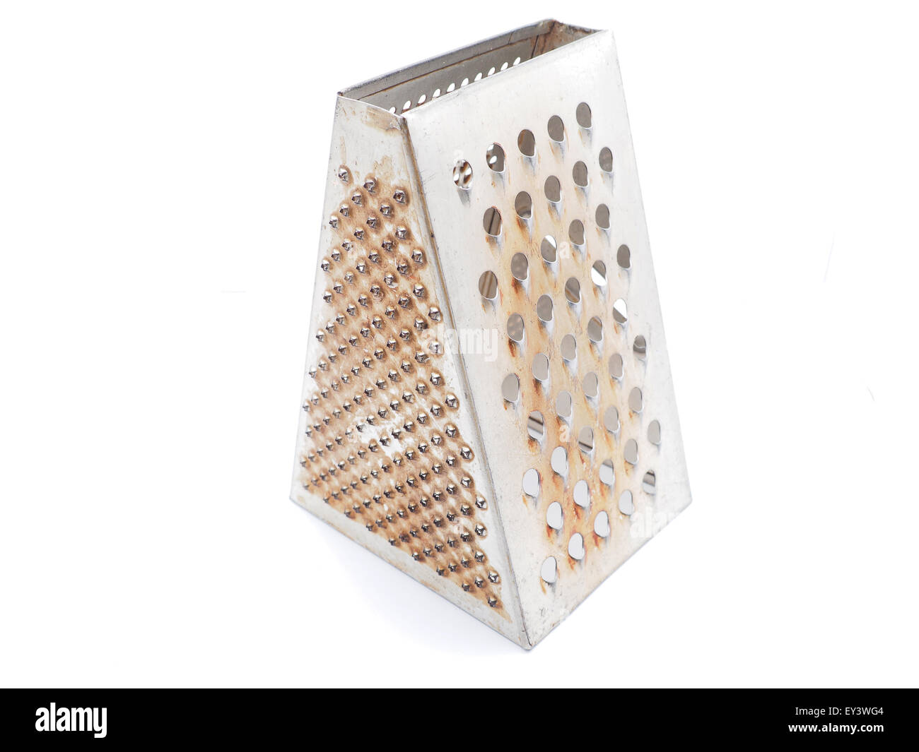 Metal grater on a white background Stock Photo - Alamy
