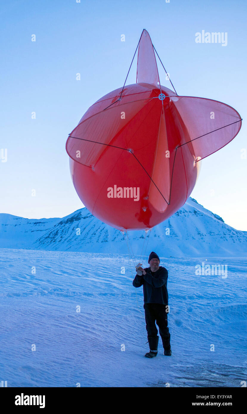 A technician of the atmospheric observatory of the AWIPEV research ...