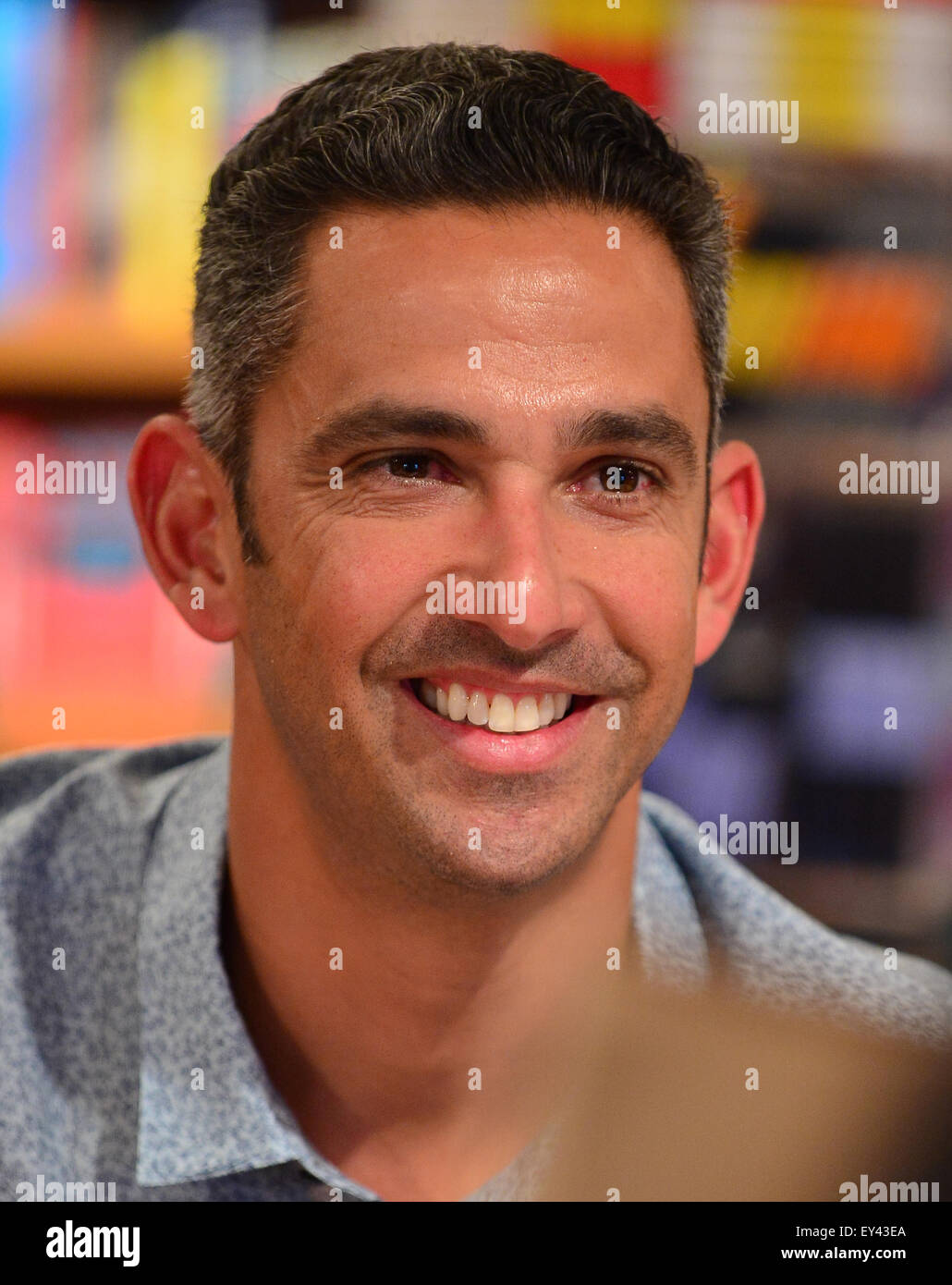 Jorge Posada greets fans and signs copies of his book 'The Journey Home ...