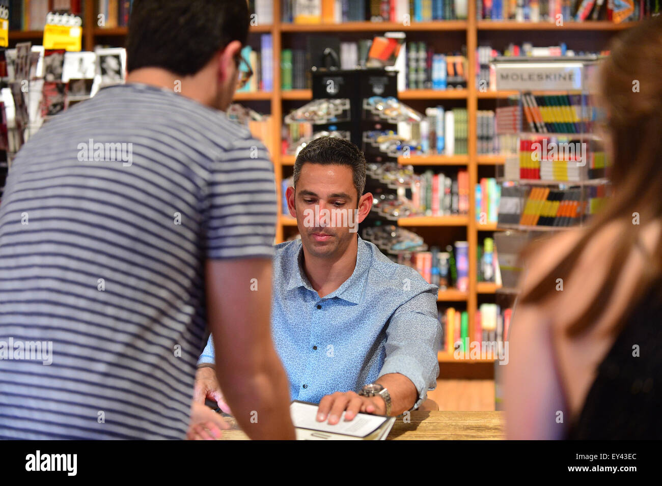 Jorge Posada greets fans and signs copies of his book 'The Journey Home ...