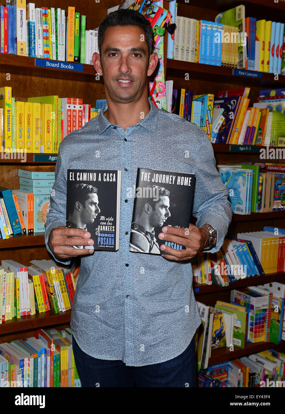 Jorge Posada greets fans and signs copies of his book 'The Journey Home ...