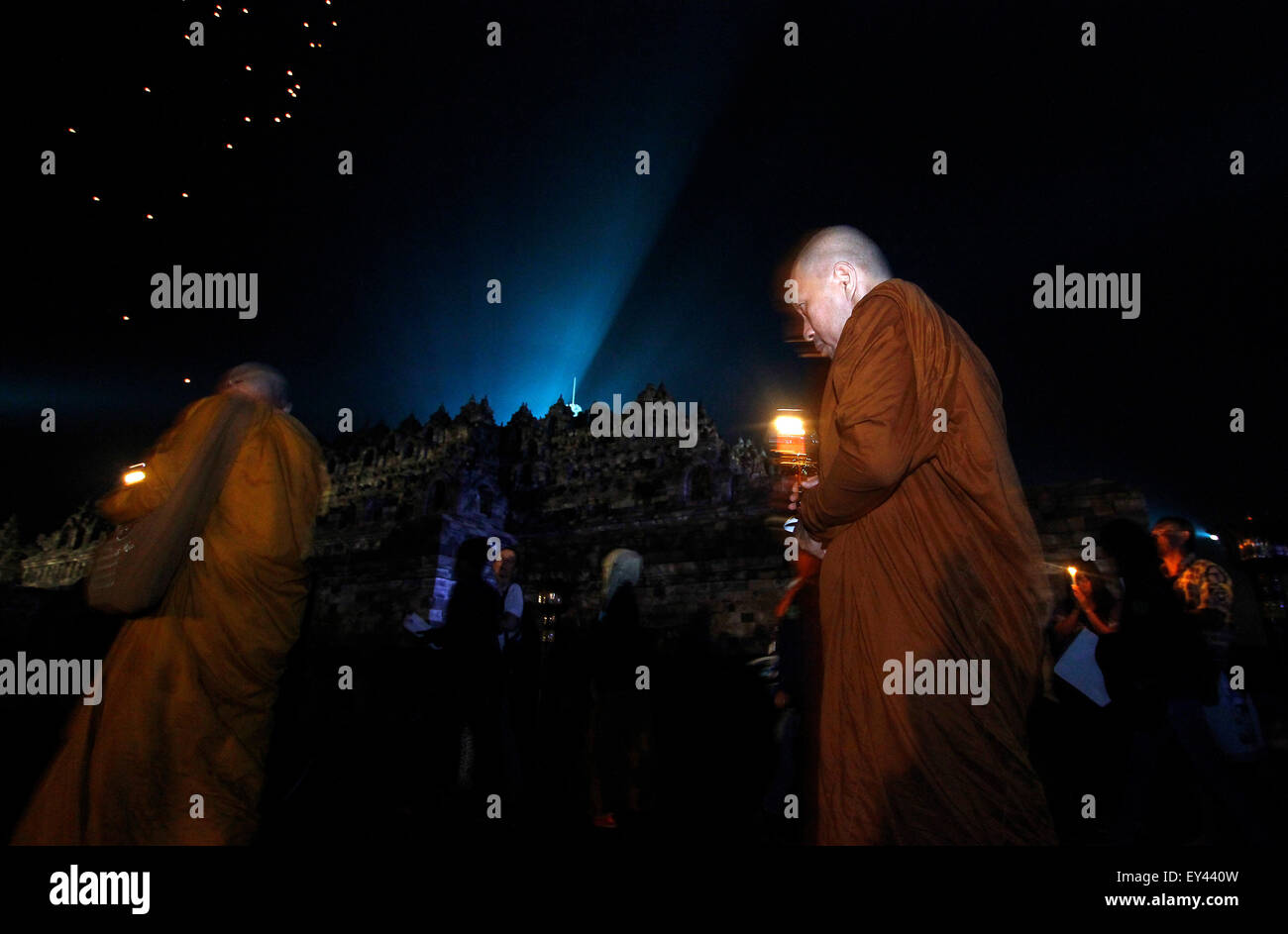 Buddhist monk join the procession from Mendut temple to Borobudur ...