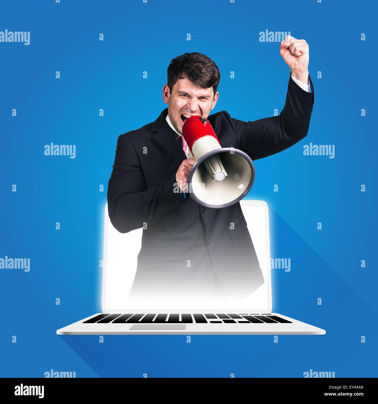 Caucasian businessman yelling through megaphone hi-res stock ...