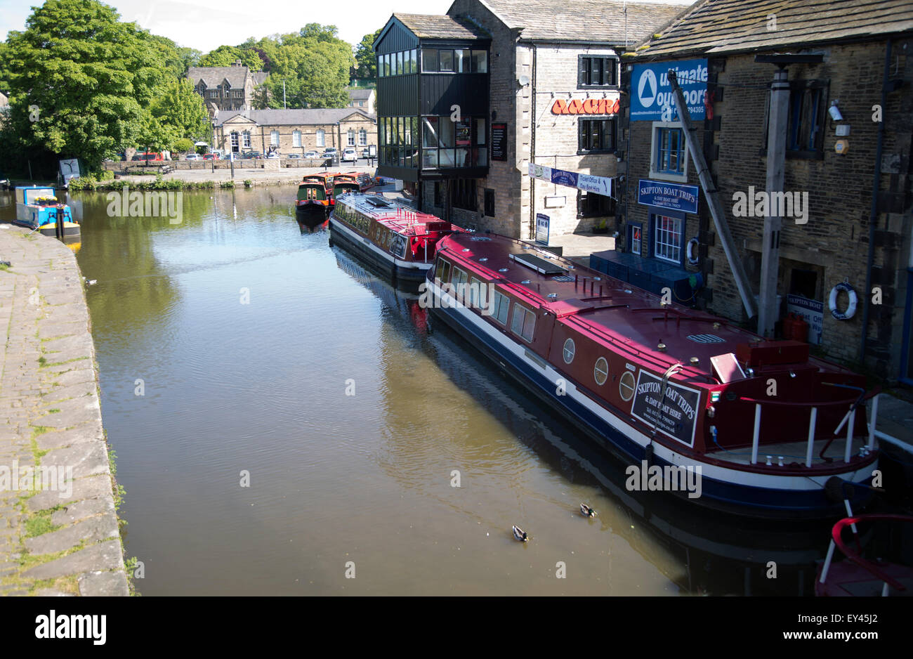 Narrow boats on canal, Skipton, North Yorkshire, England, UK Stock ...