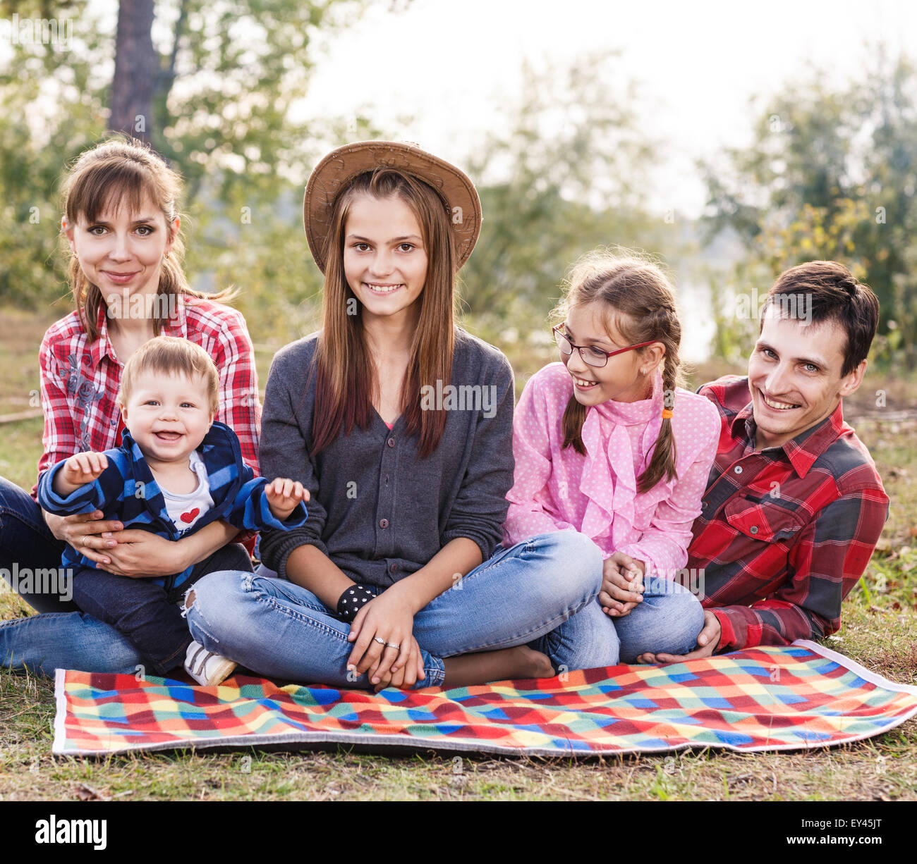 Happy family outdoors Stock Photo - Alamy