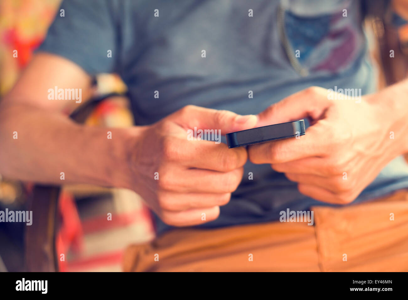 Man sitting on rocking chair hi-res stock photography and images - Alamy
