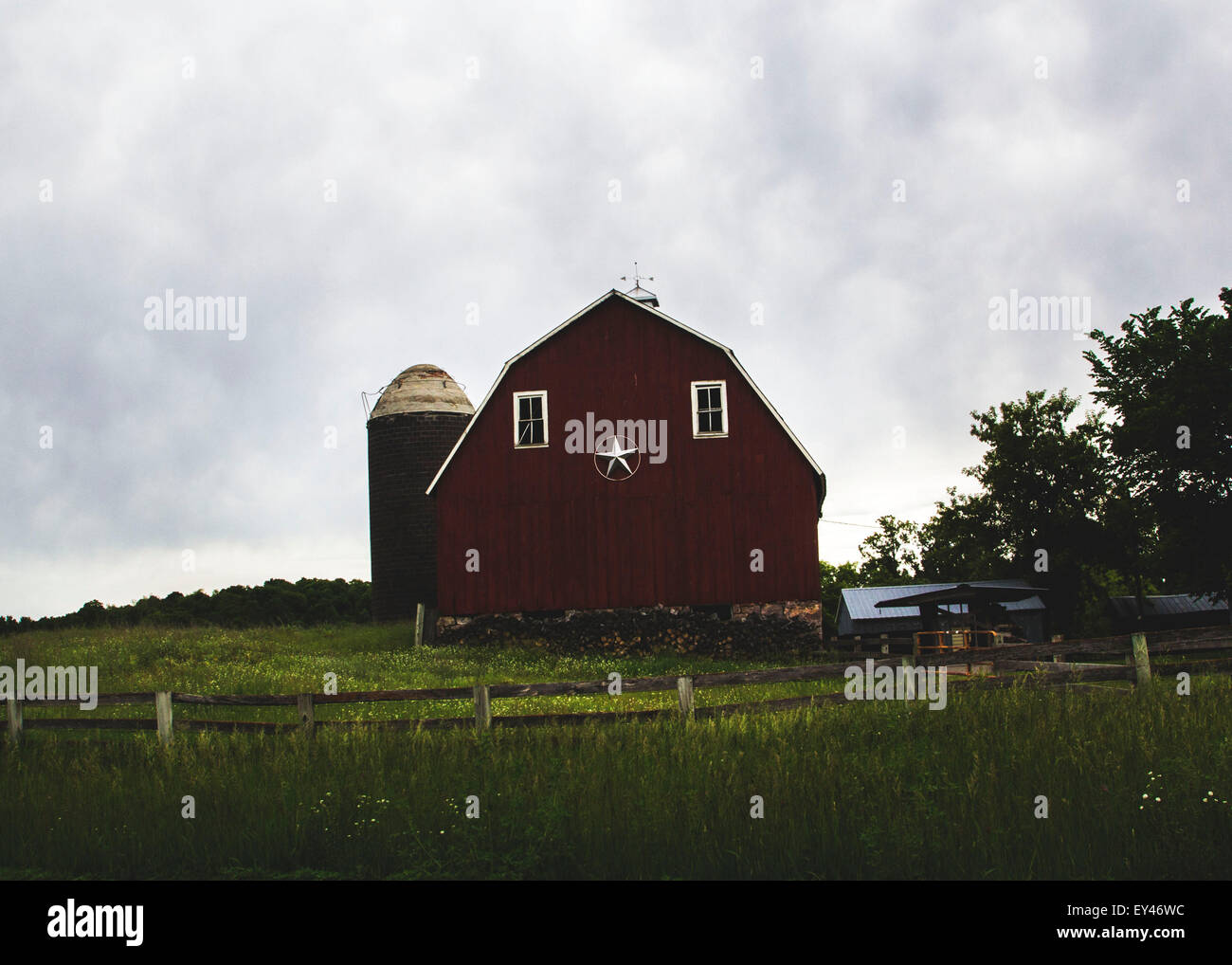 A red barn before a rainstorm Stock Photo - Alamy