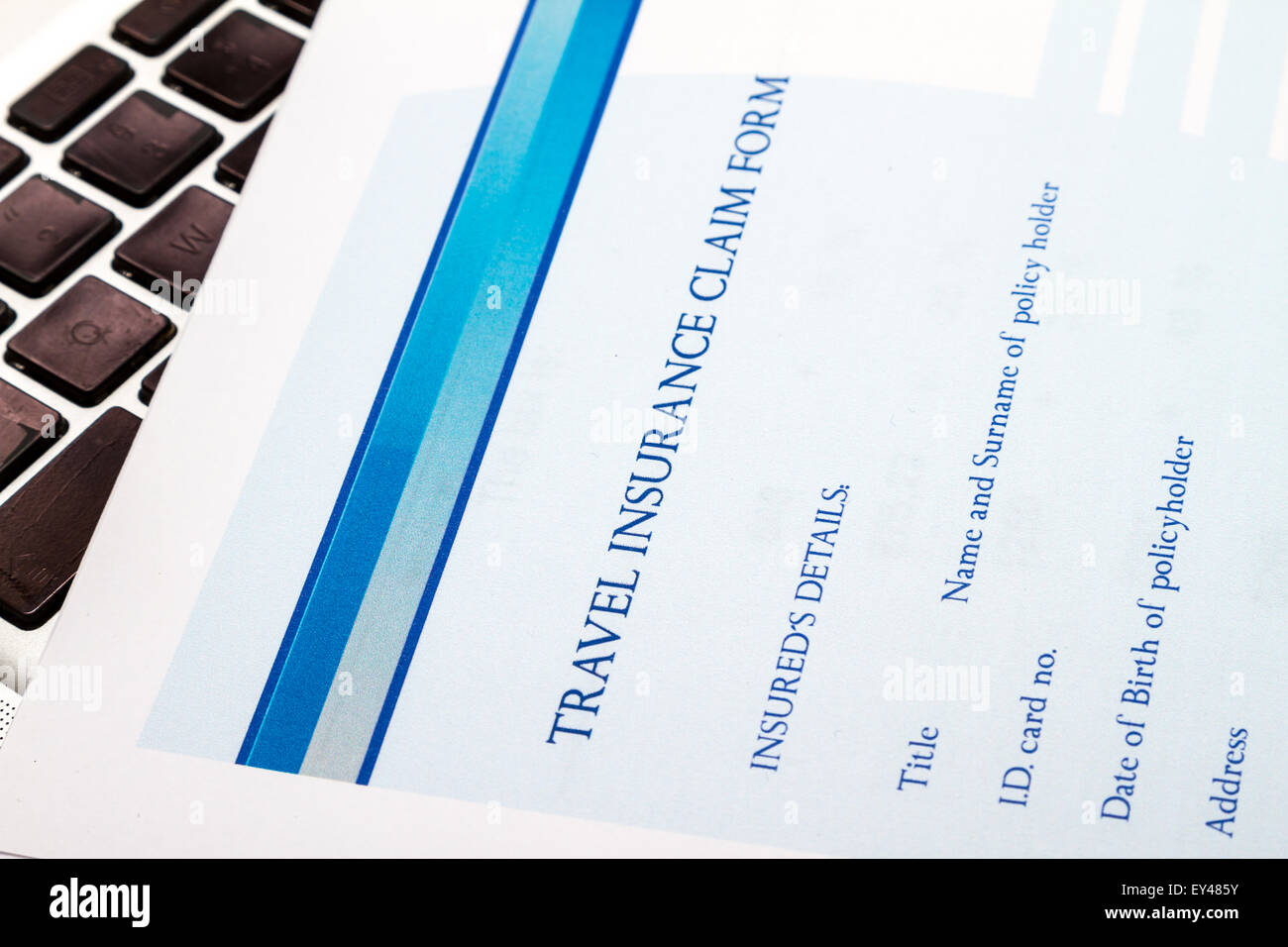 Travel insurance application form with a boarding pass and a passport ...