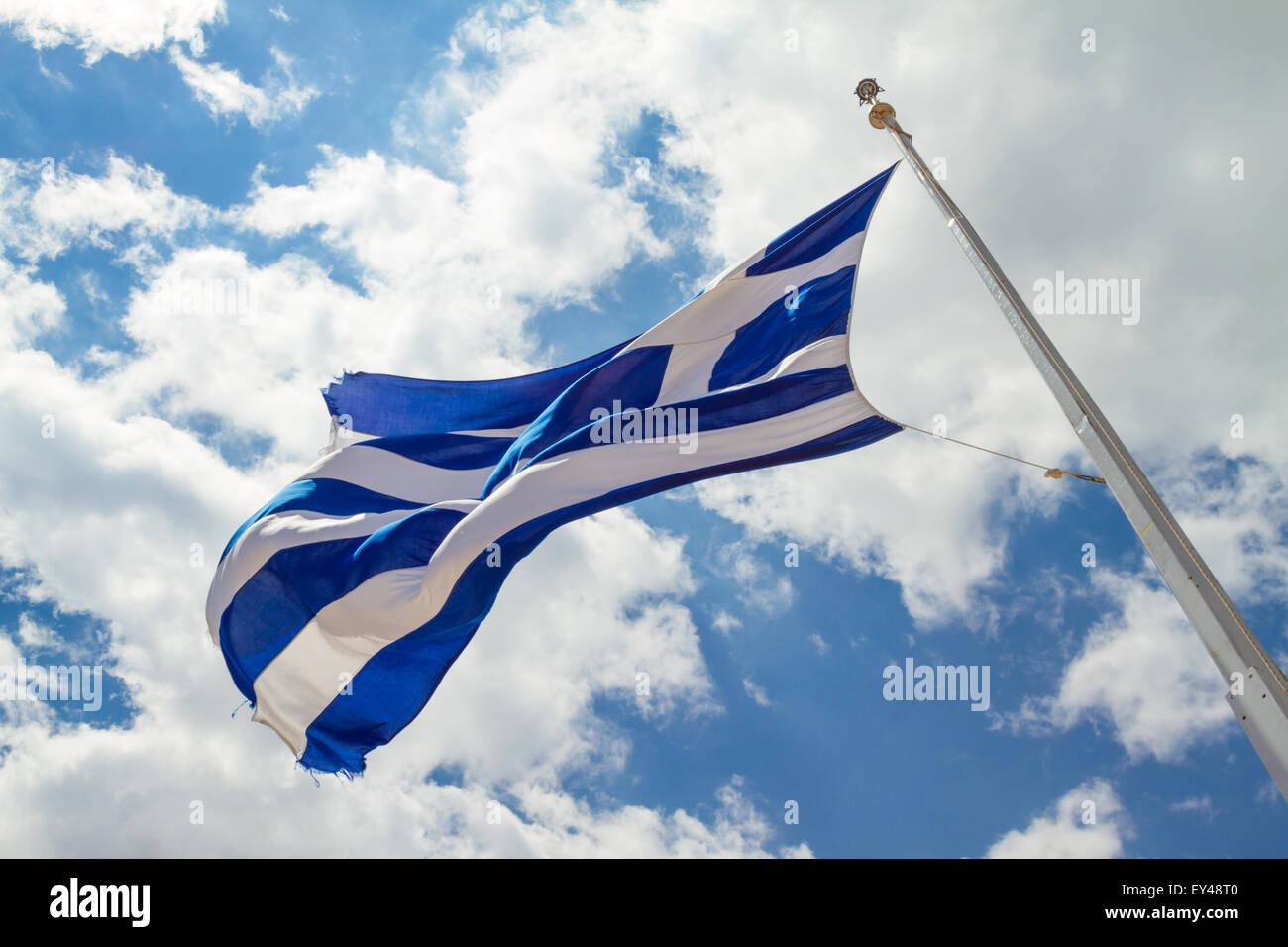 Greek flag waving in the sky Stock Photo - Alamy
